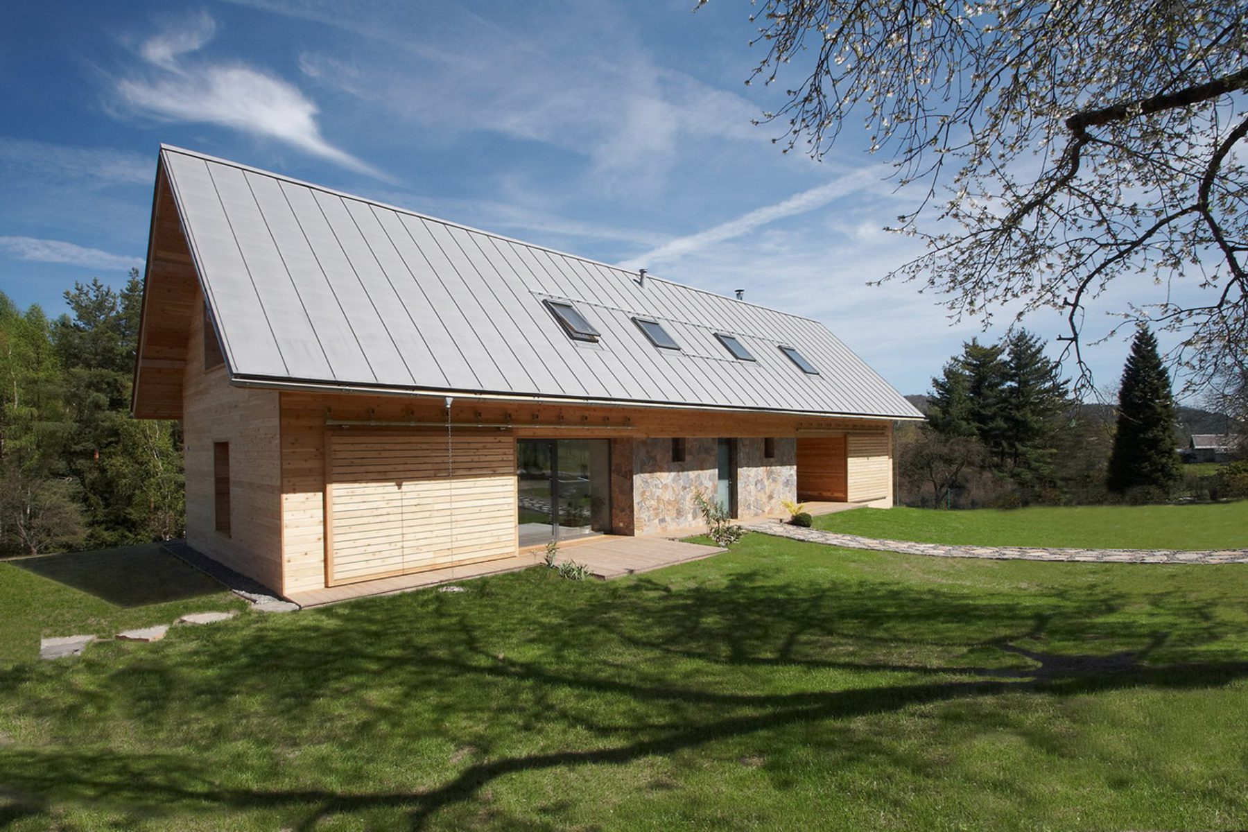 House in Czech Republic. Wood and stone enhance tradition