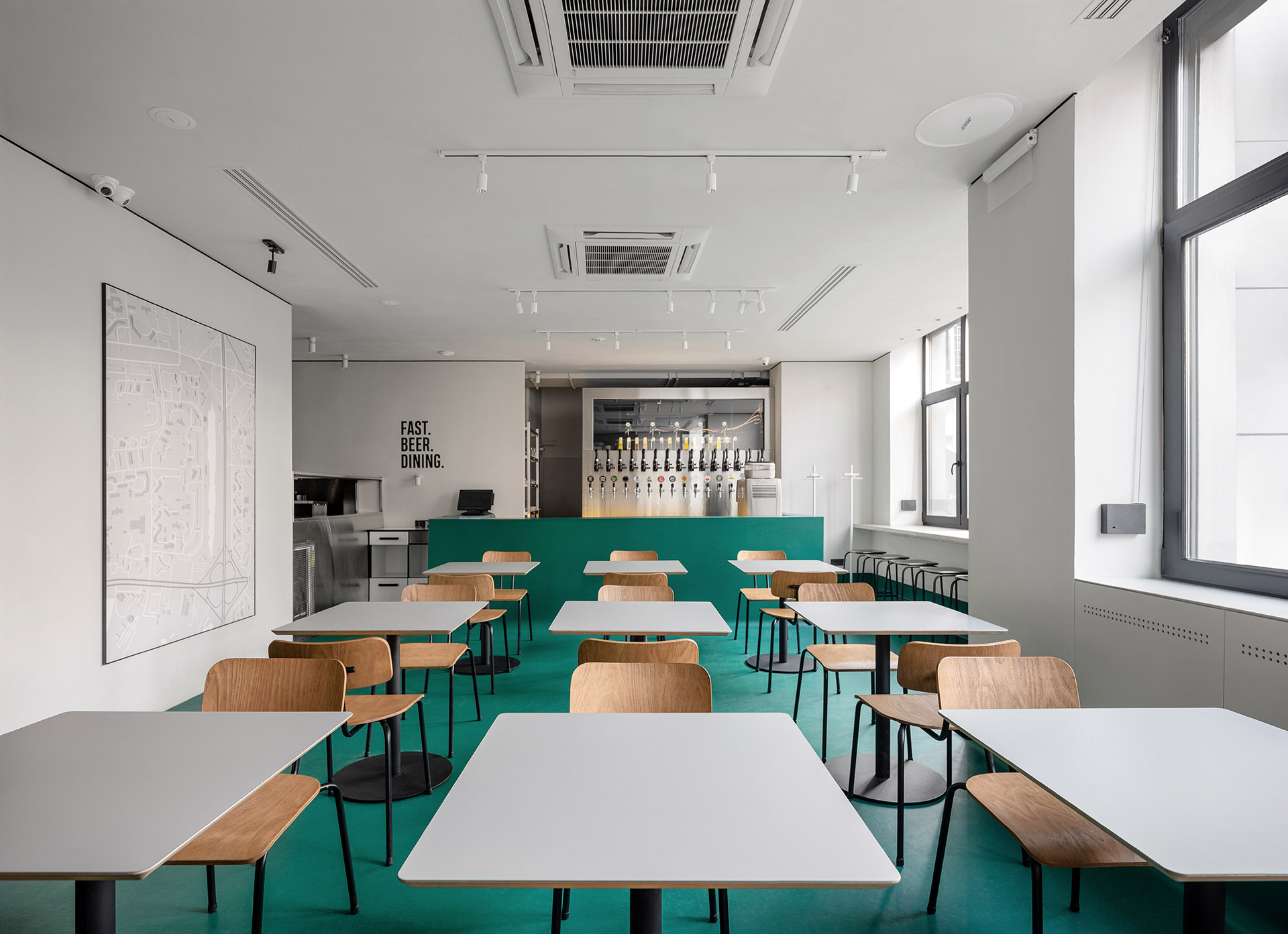 Restaurant with a lively design. Interior in various shades of green