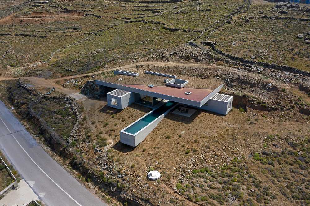 Lap Pool House: an artificial cave carved into the natural landscape of ...