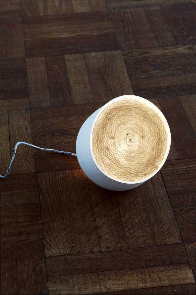 Pure design with touches of intense materials: the Colum lamp and its ...