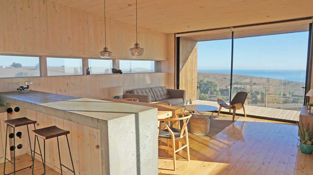 House on a hill overlooking the ocean. Terrace in the middle of the ...
