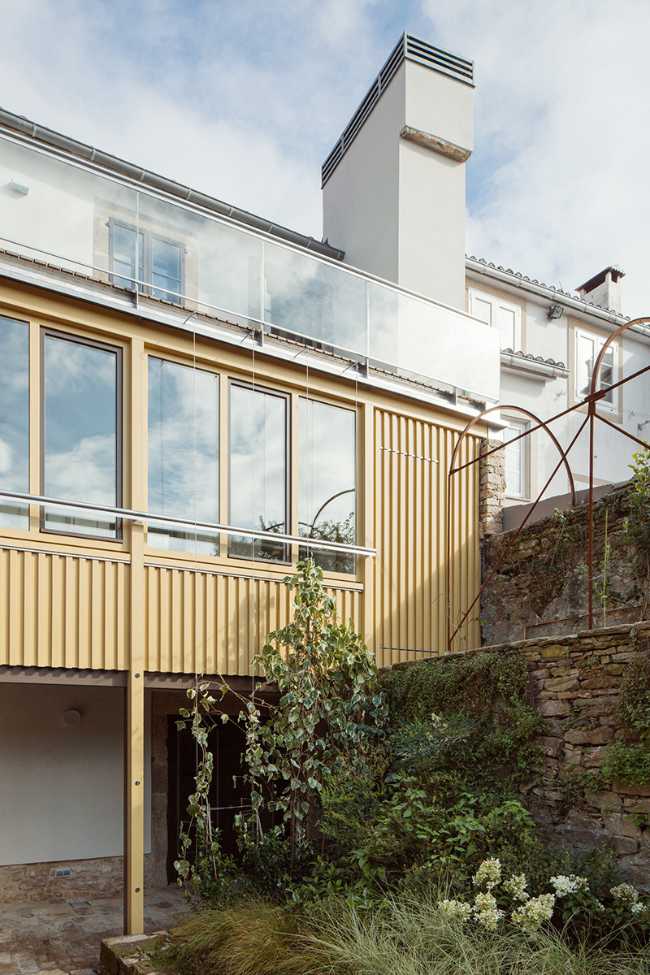 Rehabilitated building. Wood and concrete reconstruction of ...