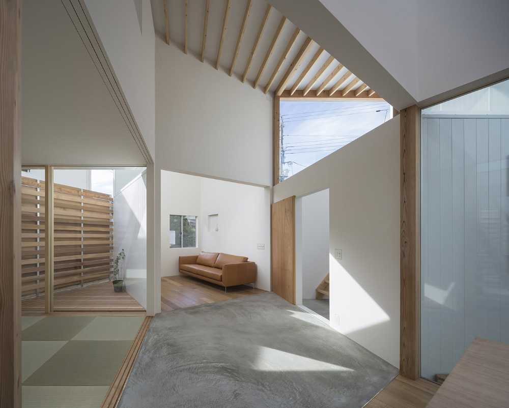 Twelve intersecting squares. House with prismatic architecture