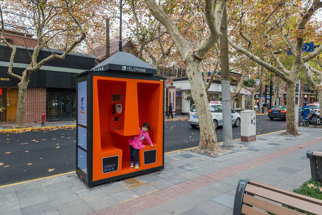 Urban furniture in Shanghai. Old telephone booths are converted into ...
