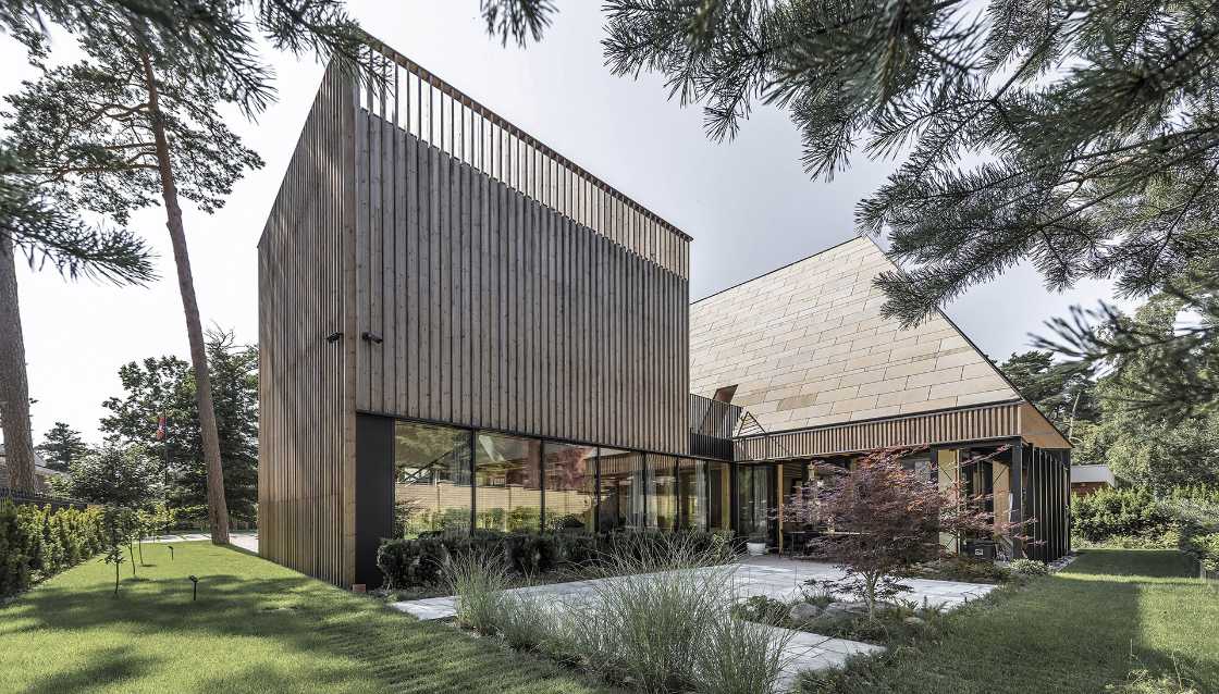Wooden villa near the Baltic Sea. Local materials as well as contact ...